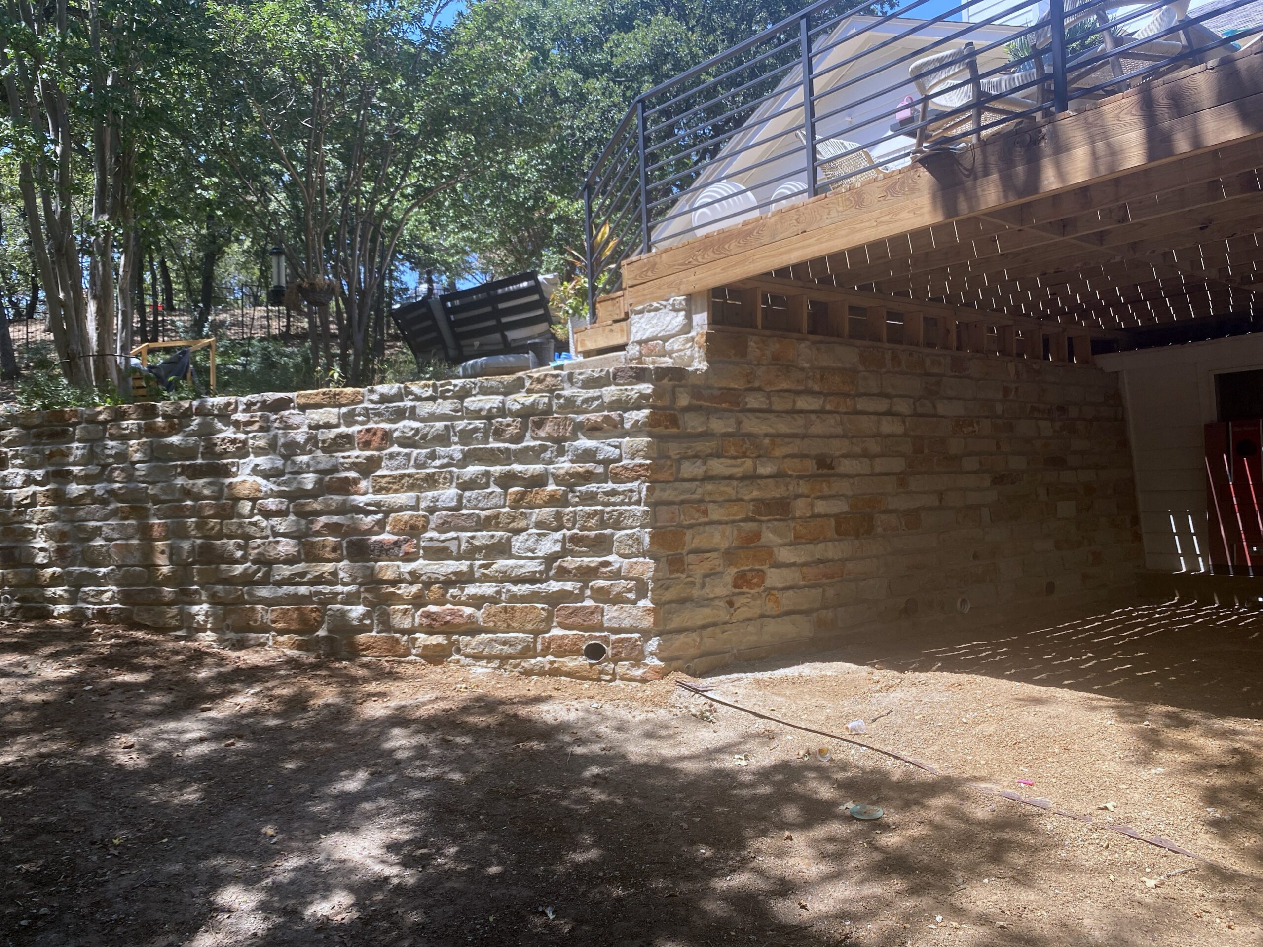 Replace tie block wall with chopped milsap stone