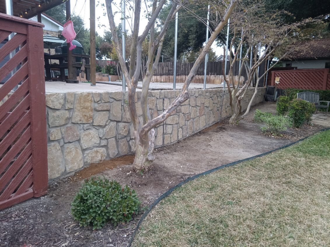 Replacing a concrete wall with a milsap stone wall in Irving